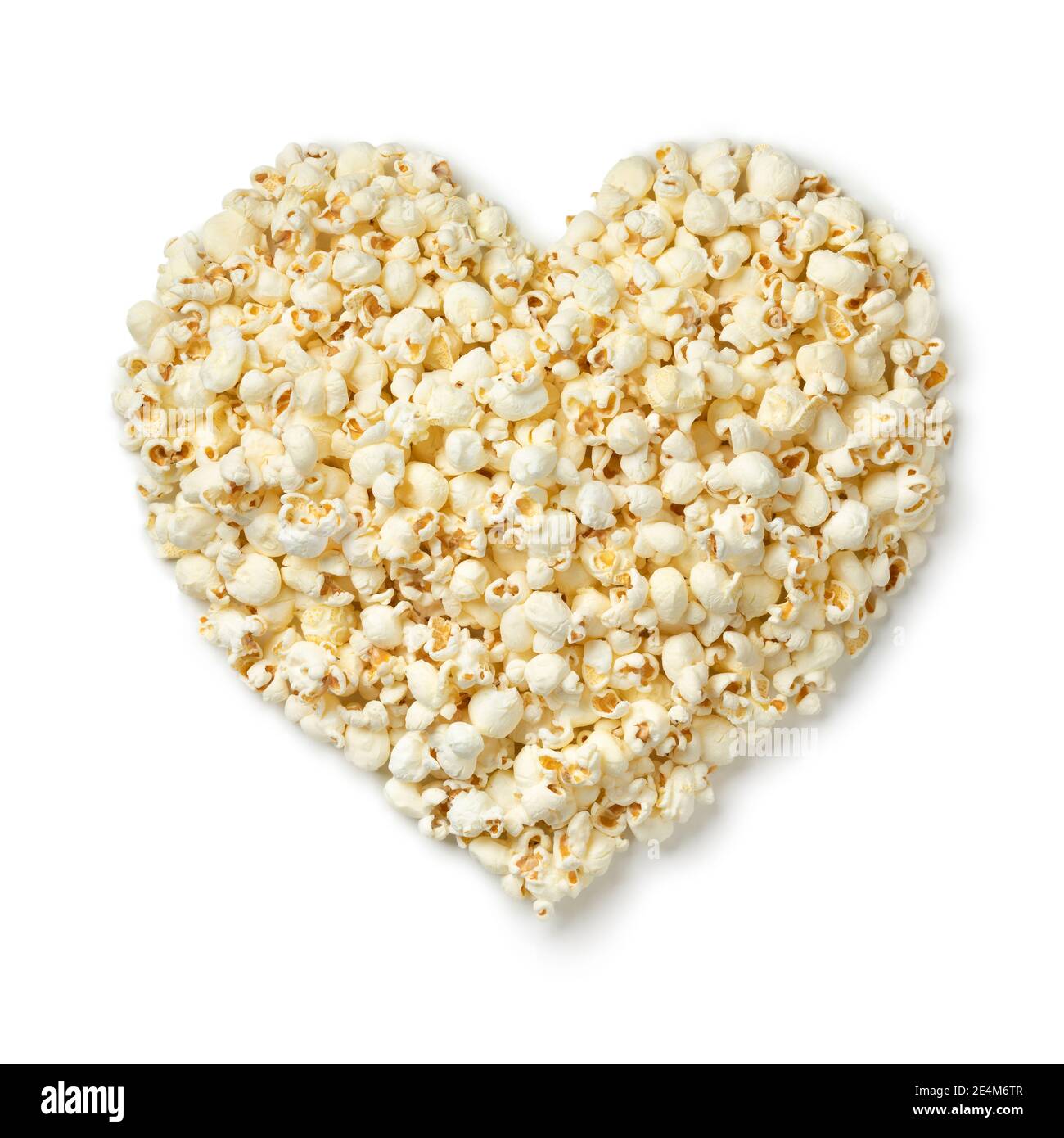 Tasty salted popcorn in heart shape isolated on white background Stock ...