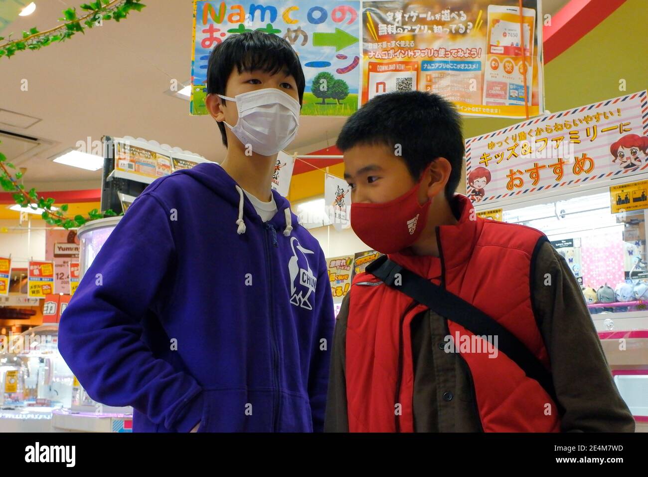 People shopping at AEON STYLE while wearing face masks as a preventive ...