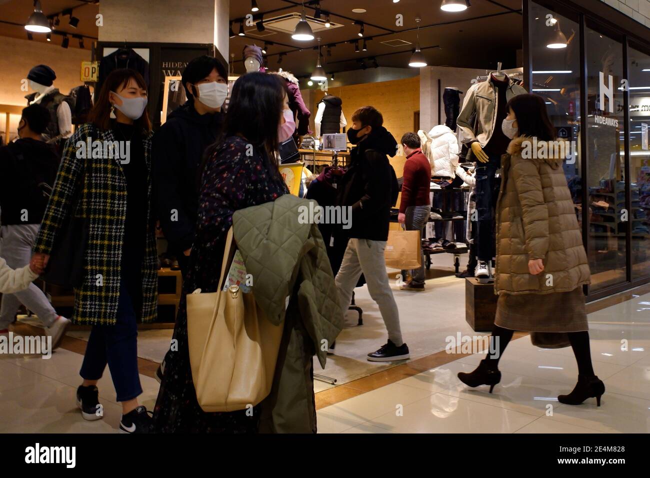 People shopping at AEON STYLE while wearing face masks as a preventive ...