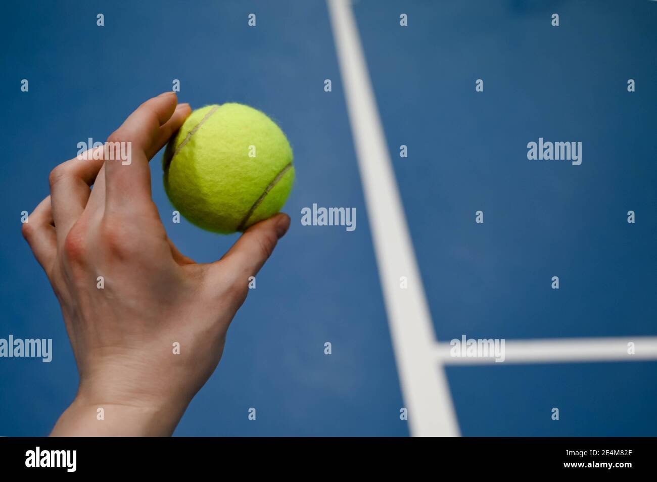 Tennis ball in hand hi-res stock photography and images - Alamy