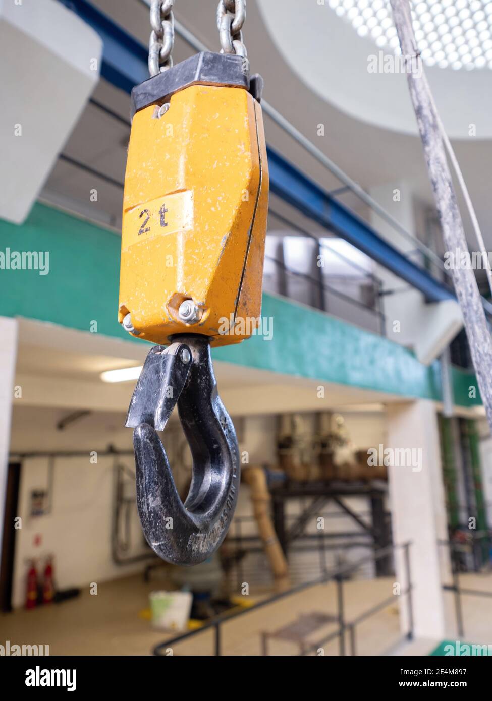 Close up view of hook. The empty hook hang on room crane Stock Photo ...