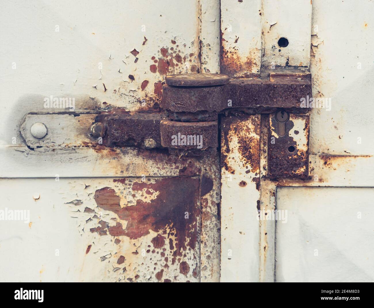 Rusty latch and lock housing, rusty metal door frame. Advanced ...