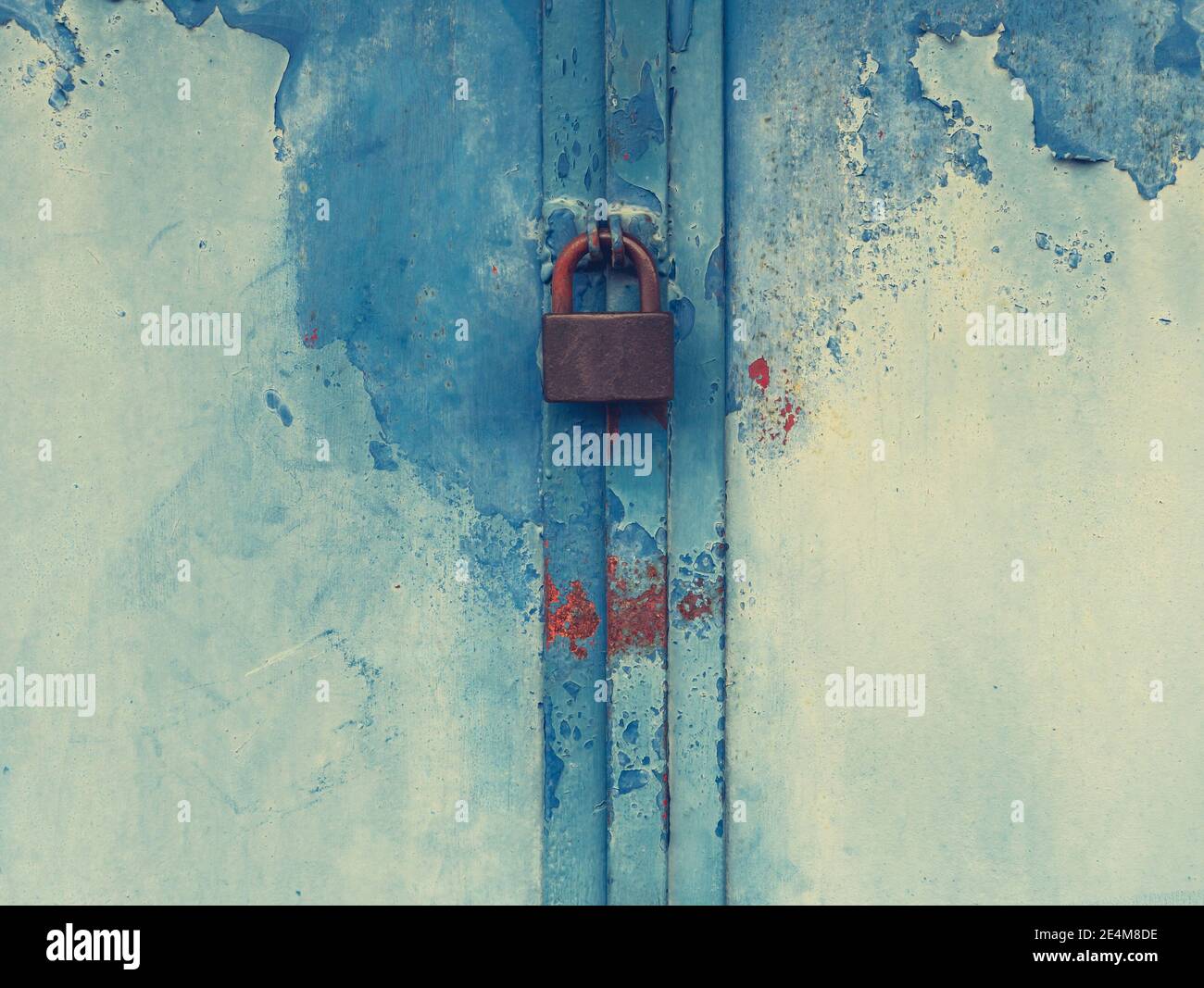 Detail of Grunge Old Door with obsolete yellow green paint. Rusty marks ...