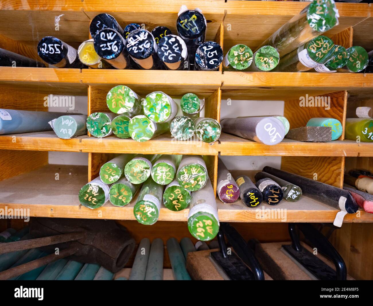 Colorful glass rods in rack. Source glasrods in a traditional glass ...