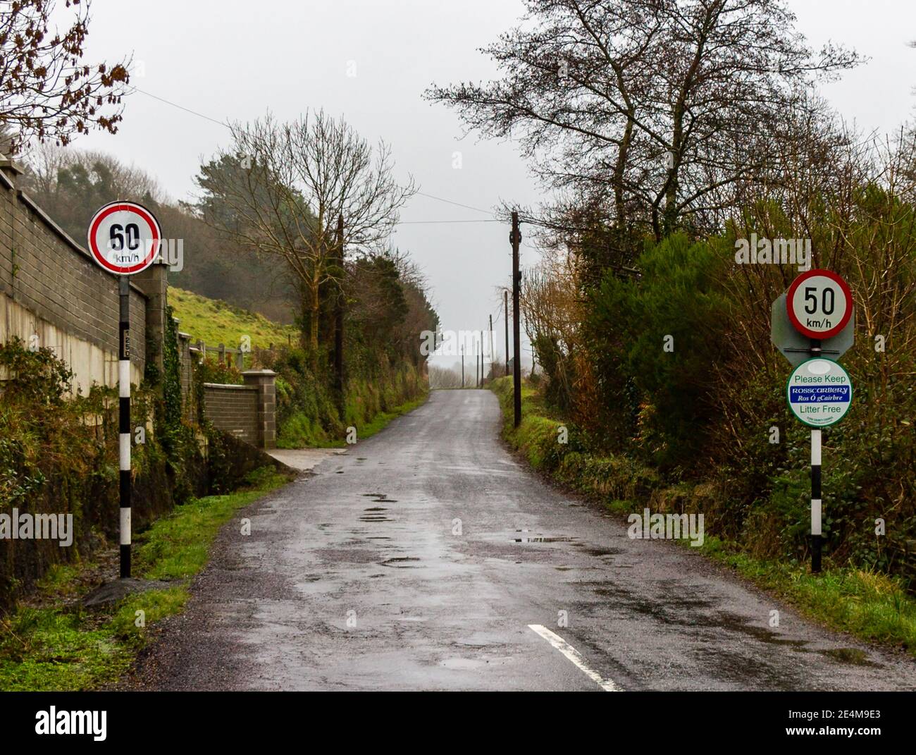 Different speed limit signs on the same road Stock Photo - Alamy