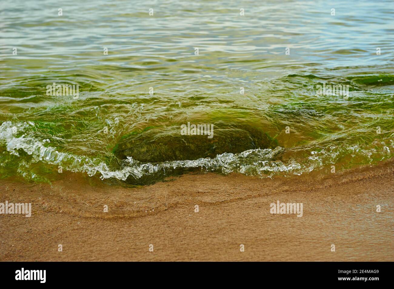 Water flowing over stone Stock Photo - Alamy
