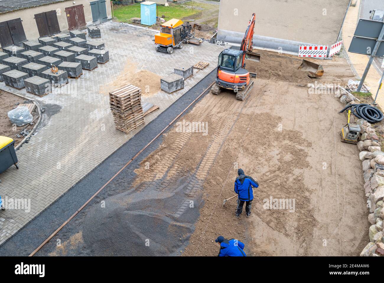 a courtyard is paved with paving stones by a civil engineering company ...