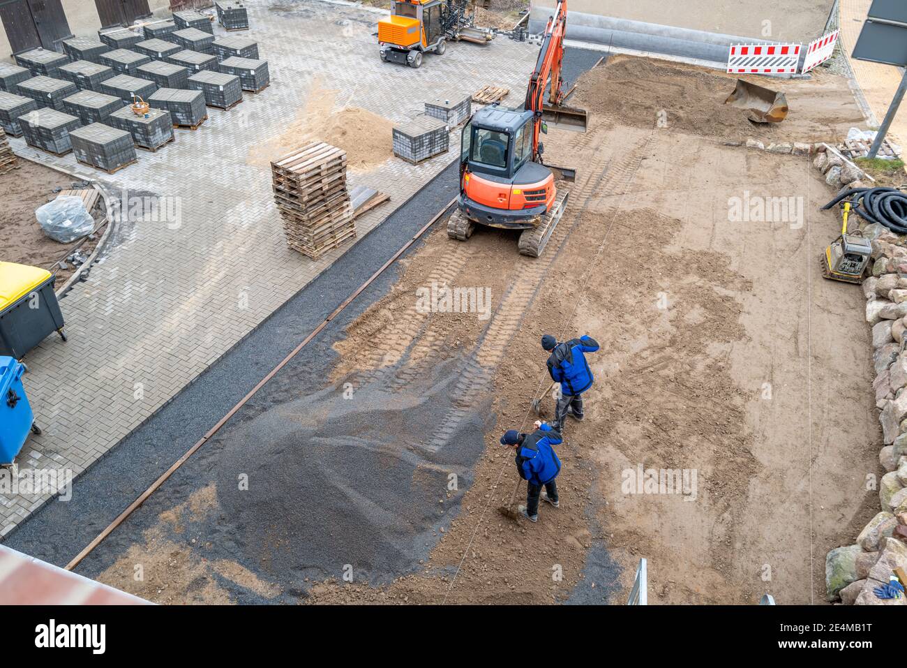 a courtyard is paved with paving stones by a civil engineering company ...