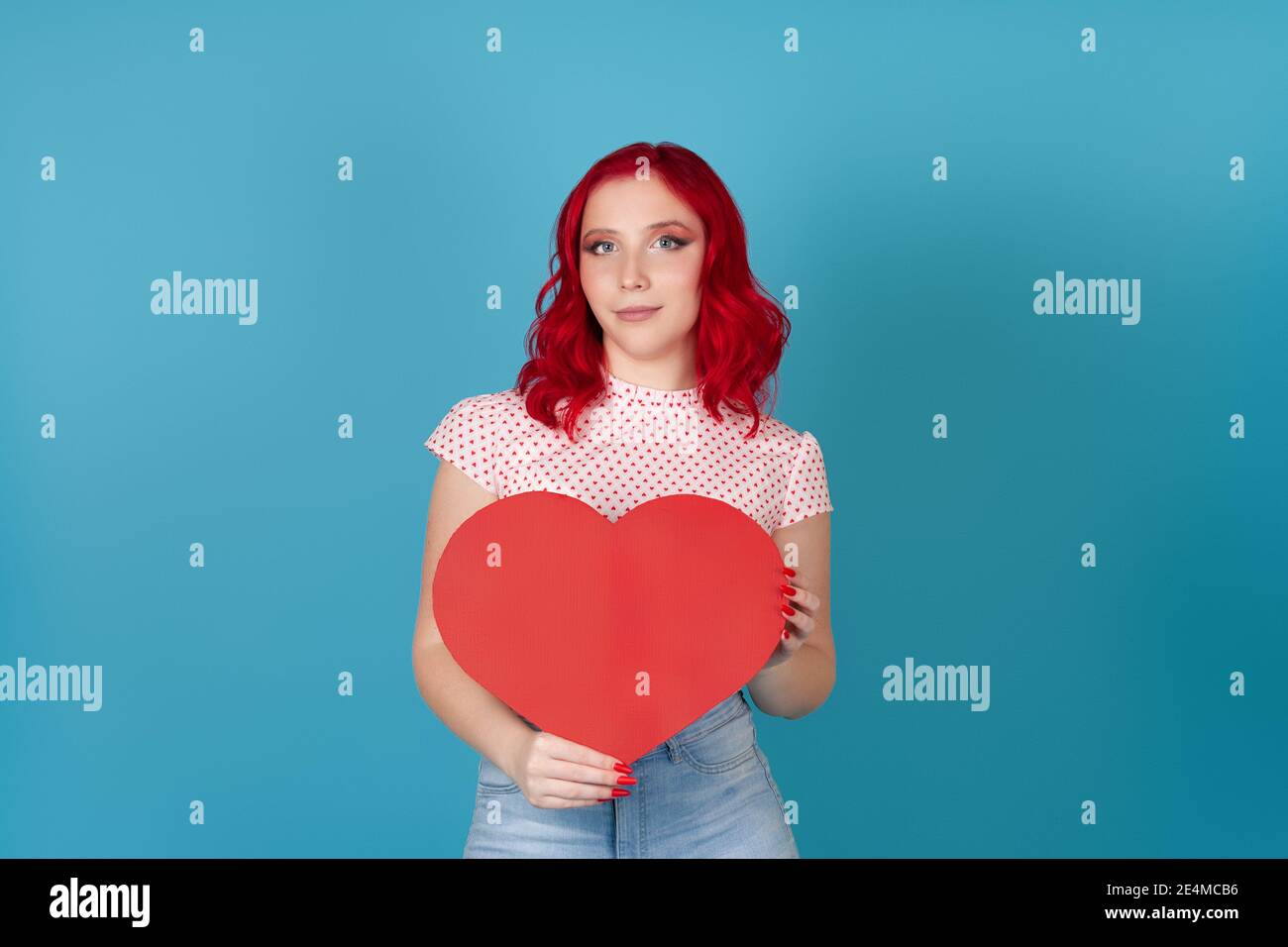 Woman holding chest heart hi-res stock photography and images - Alamy