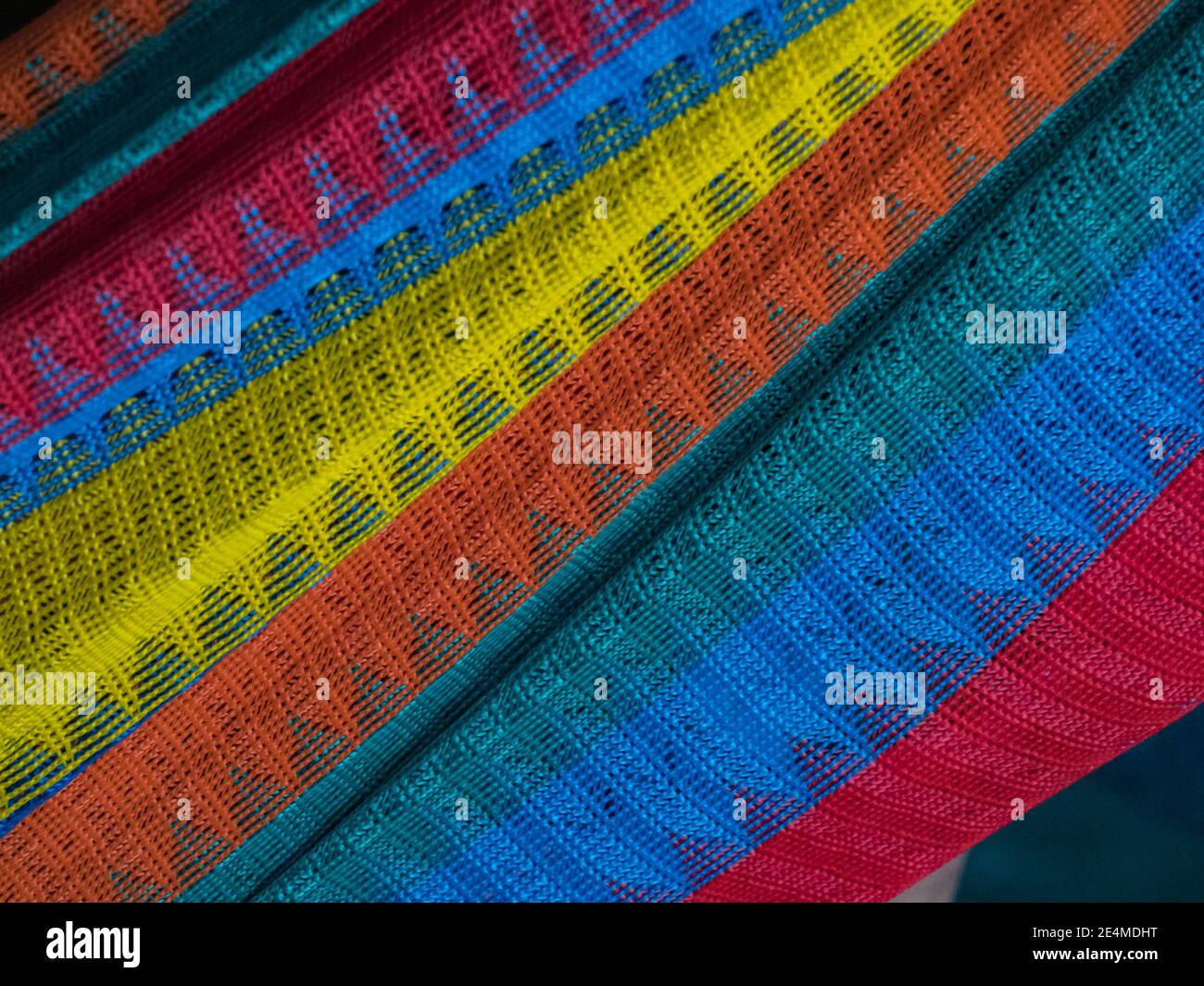 Beautiful, colorful hammocks on the cargo boat. Amazonia, trail from ...