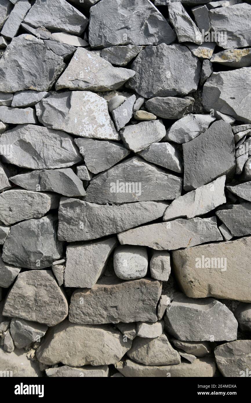 Pattern formed by a dry stone wall. No people Stock Photo - Alamy