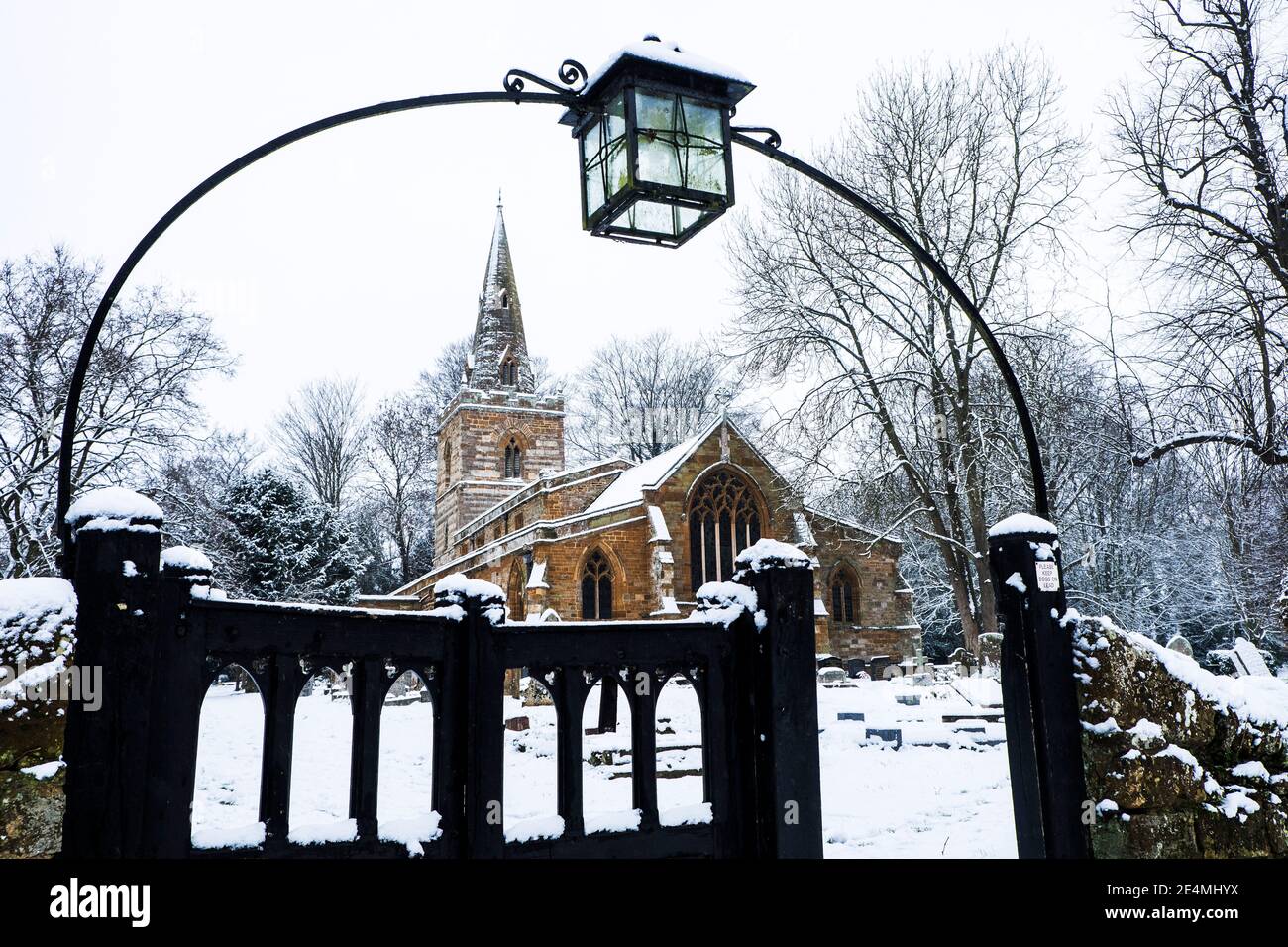 St Michael and All Angels Church, Bugbrooke in the sno Stock Photo - Alamy