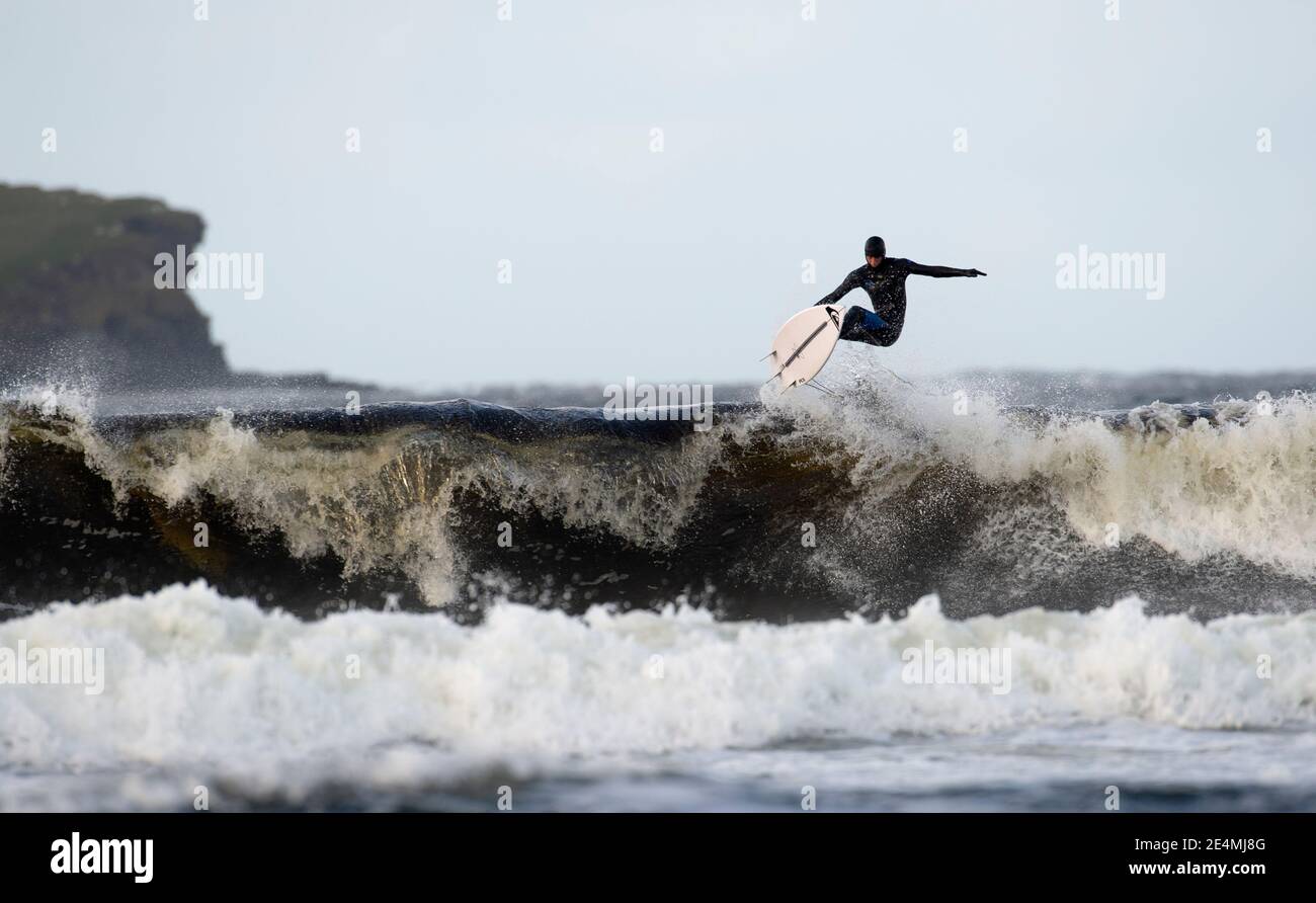 Wetsuit surfer wave hi-res stock photography and images - Alamy