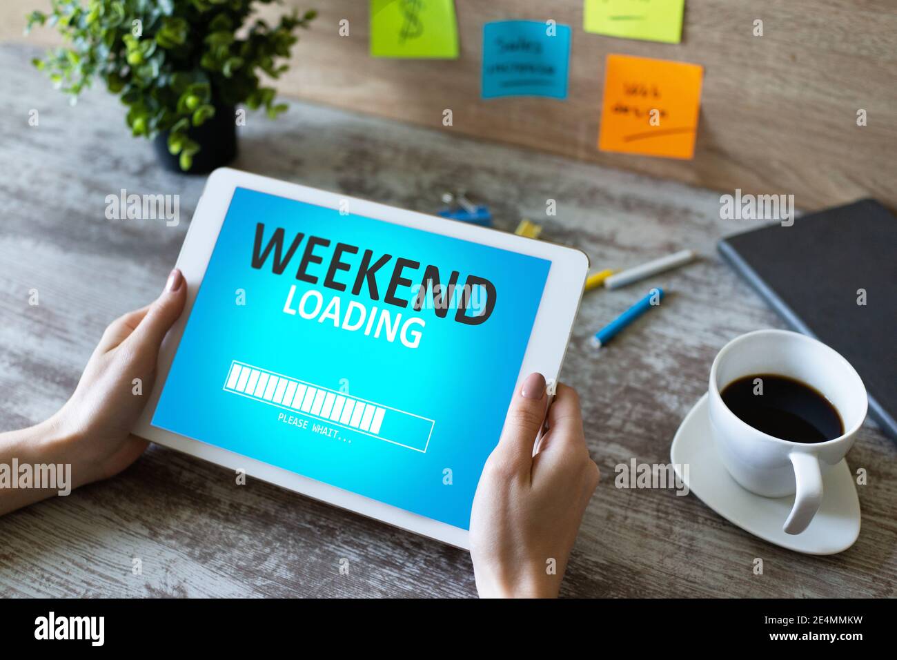 Weekend loading status bar message on device screen Stock Photo - Alamy