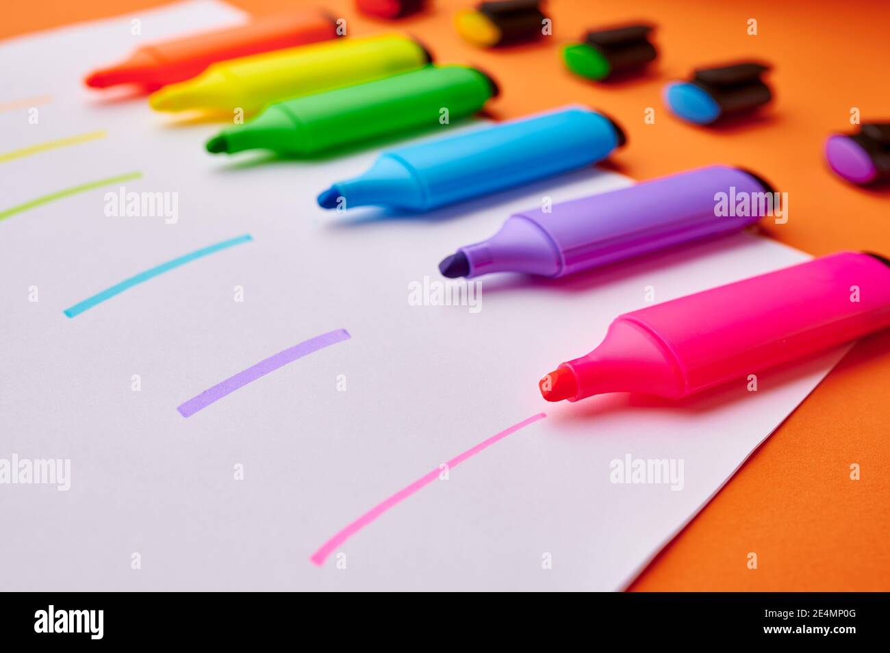 Colorful permanent markers on paper sheet Stock Photo - Alamy