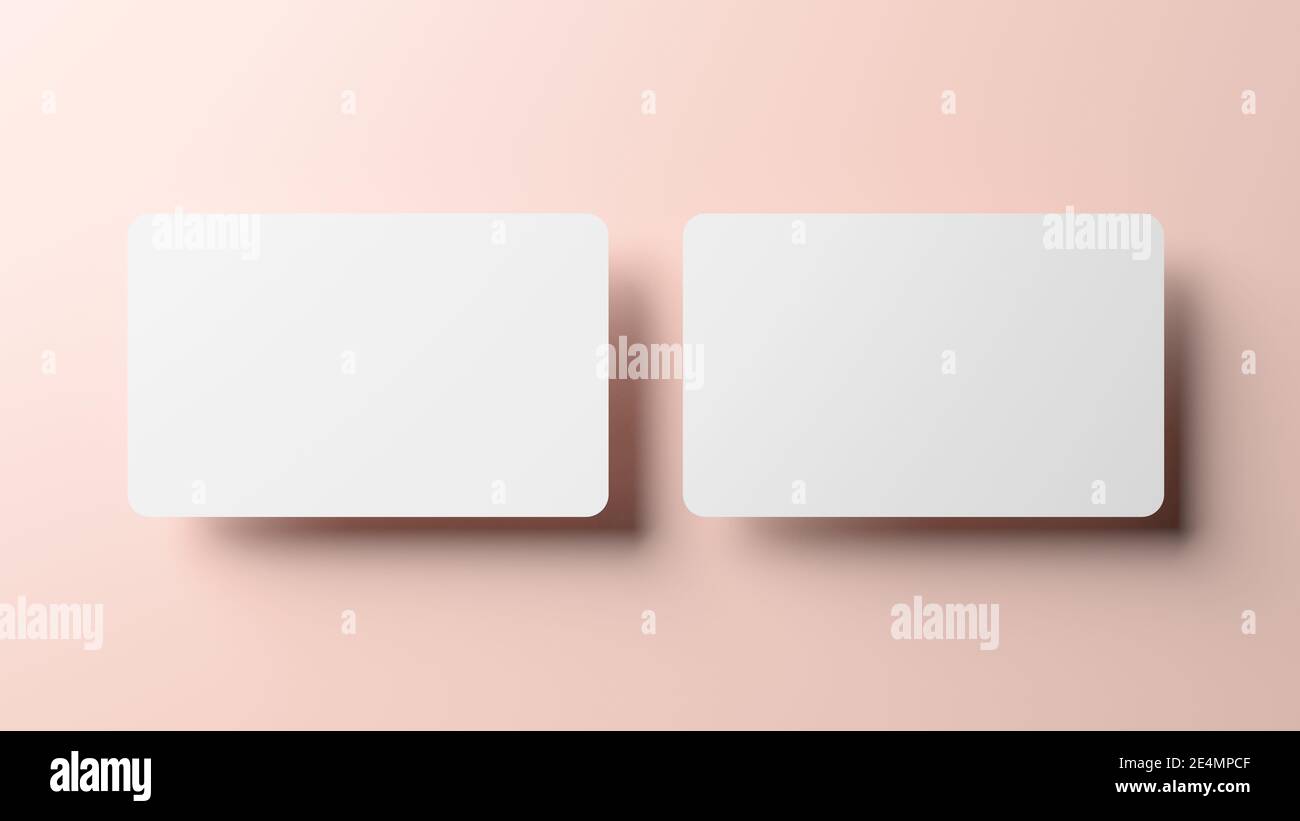 Blank credit card mockup front and back over a neutral background in ...
