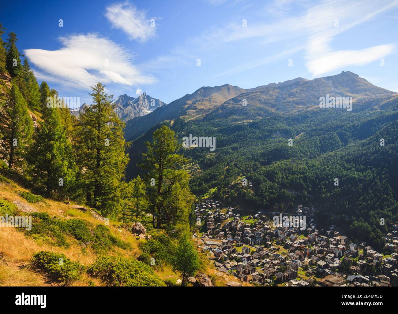 Zermatt in the swiss alps wallis with trees forest wood sunlight ...