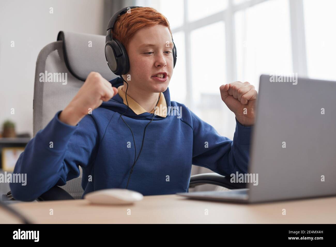 Boy celebrating video game hi-res stock photography and images - Alamy