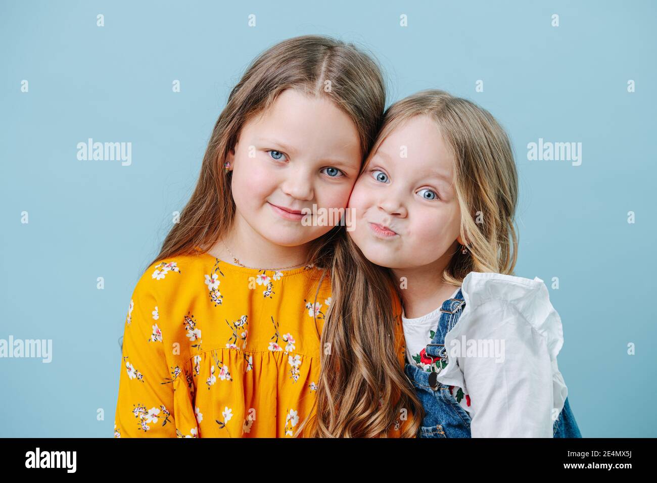 close up image, portrait of two sisters Stock Photo - Alamy