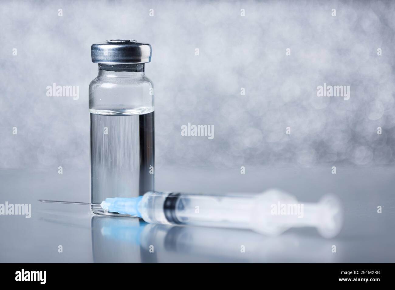 Medical ampoule for injection on gray. Vaccination medicine Stock Photo ...