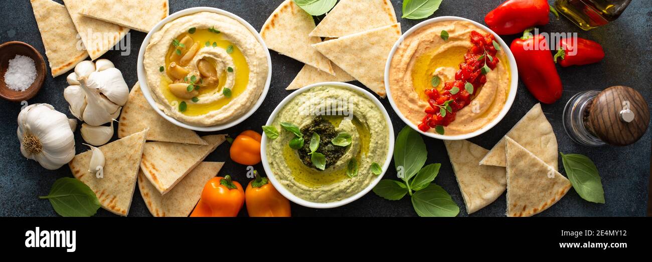 Hummus board with pita Stock Photo - Alamy