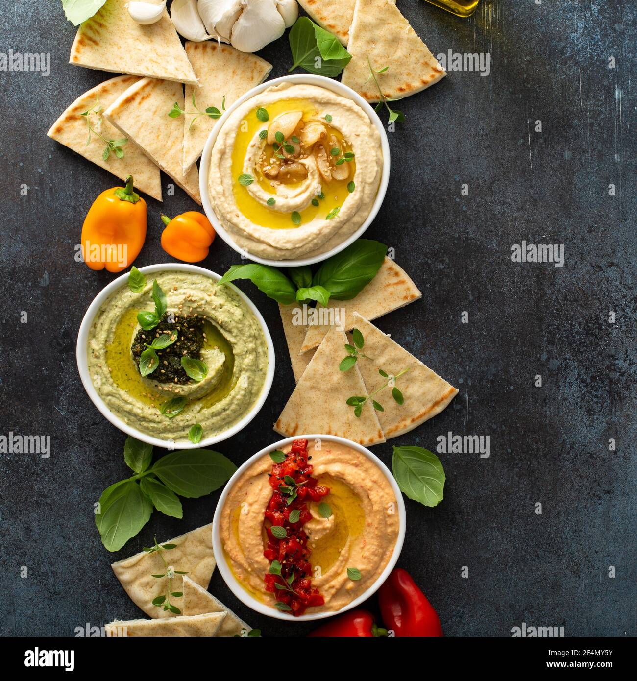 Hummus board with pita Stock Photo - Alamy