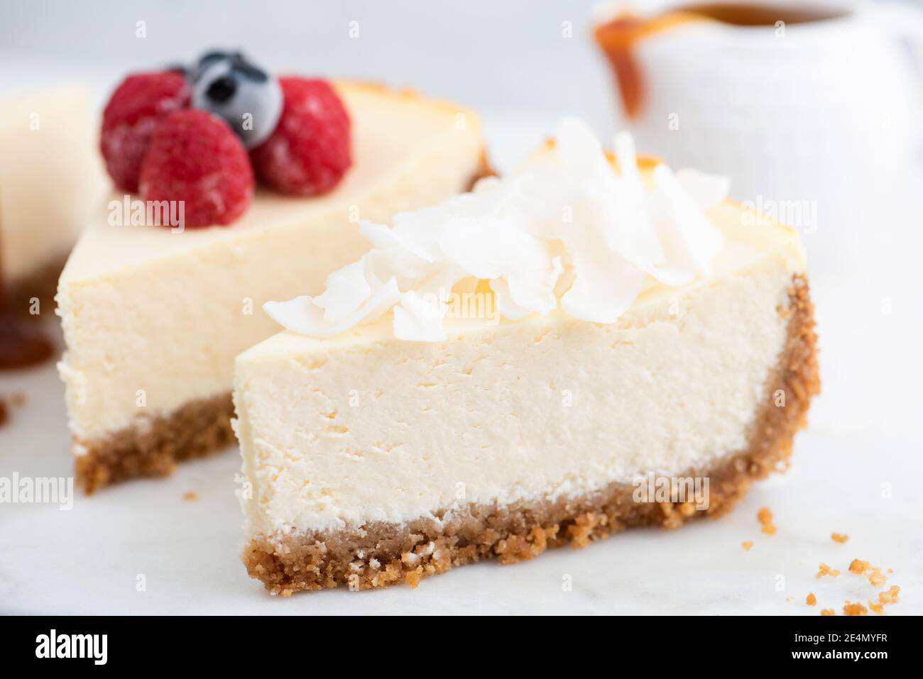 Cheesecake slices with different toppings, closeup view. New York ...