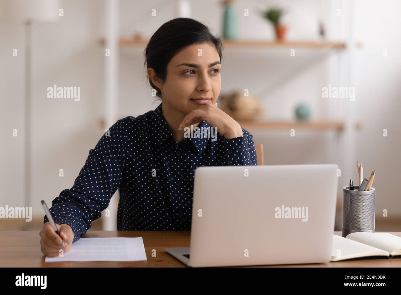 Indian lady sitting hi-res stock photography and images - Alamy
