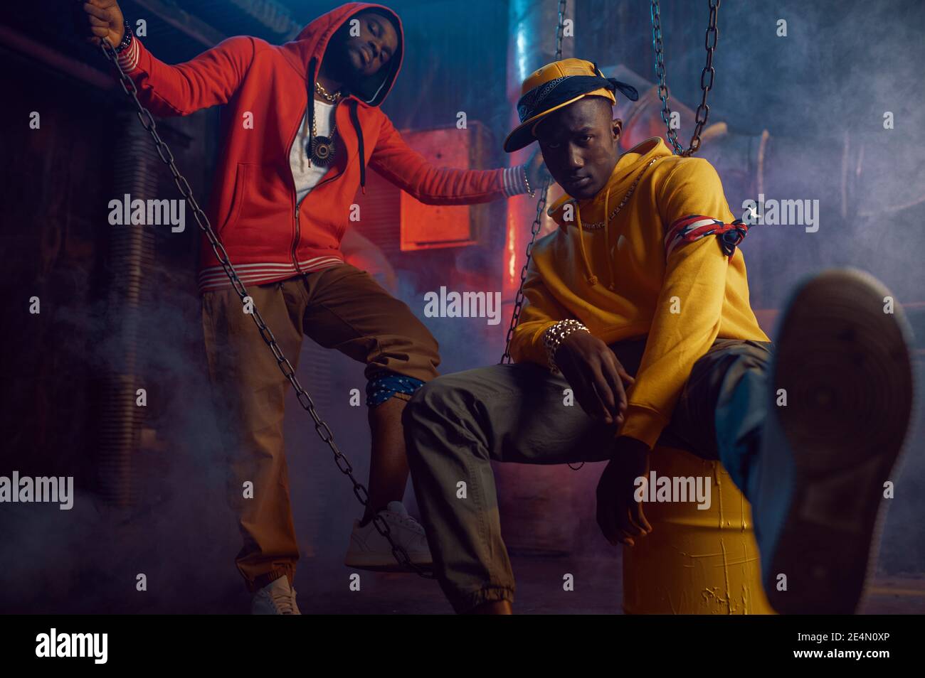 Two stylish rappers dancing in studio Stock Photo - Alamy