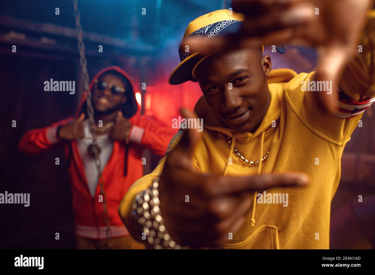 Two smiling rappers, breakdancing in studio Stock Photo - Alamy