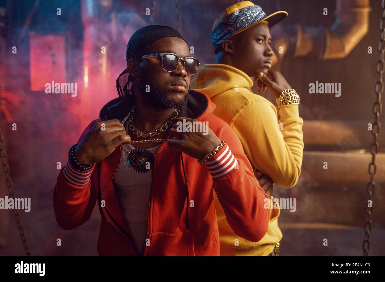 Two serious rappers, breakdancing in studio Stock Photo - Alamy