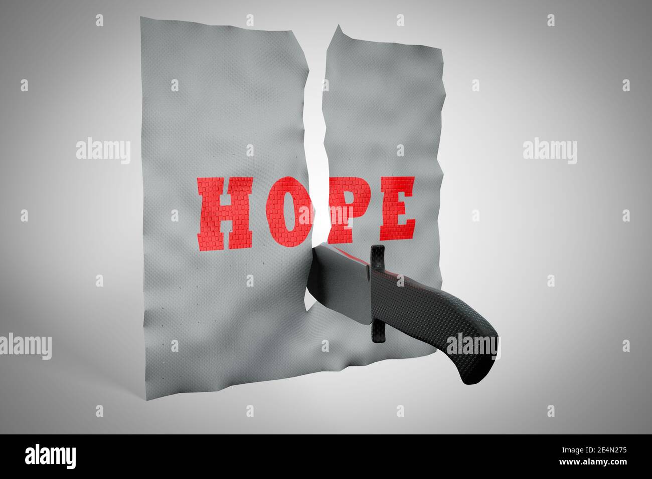 Knife cut paper with the hope written on demonstrating lost hope ...