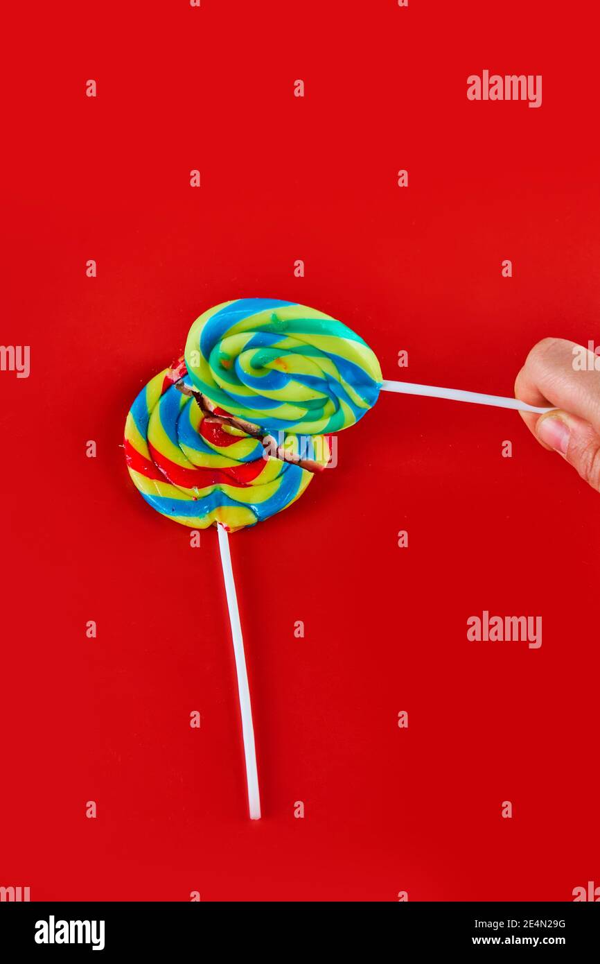 Red and yellow lolly hi-res stock photography and images - Alamy