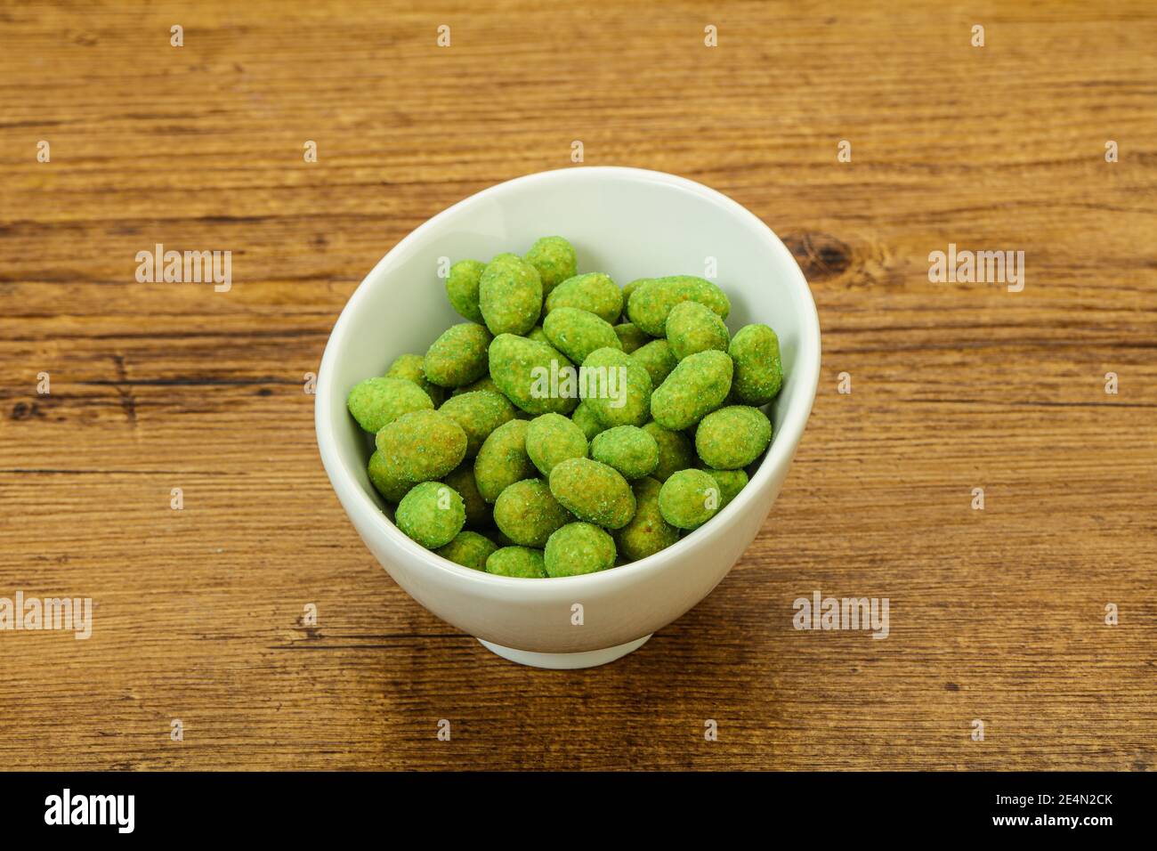 Spicy wasabi peanuts snack in the bowl Stock Photo - Alamy