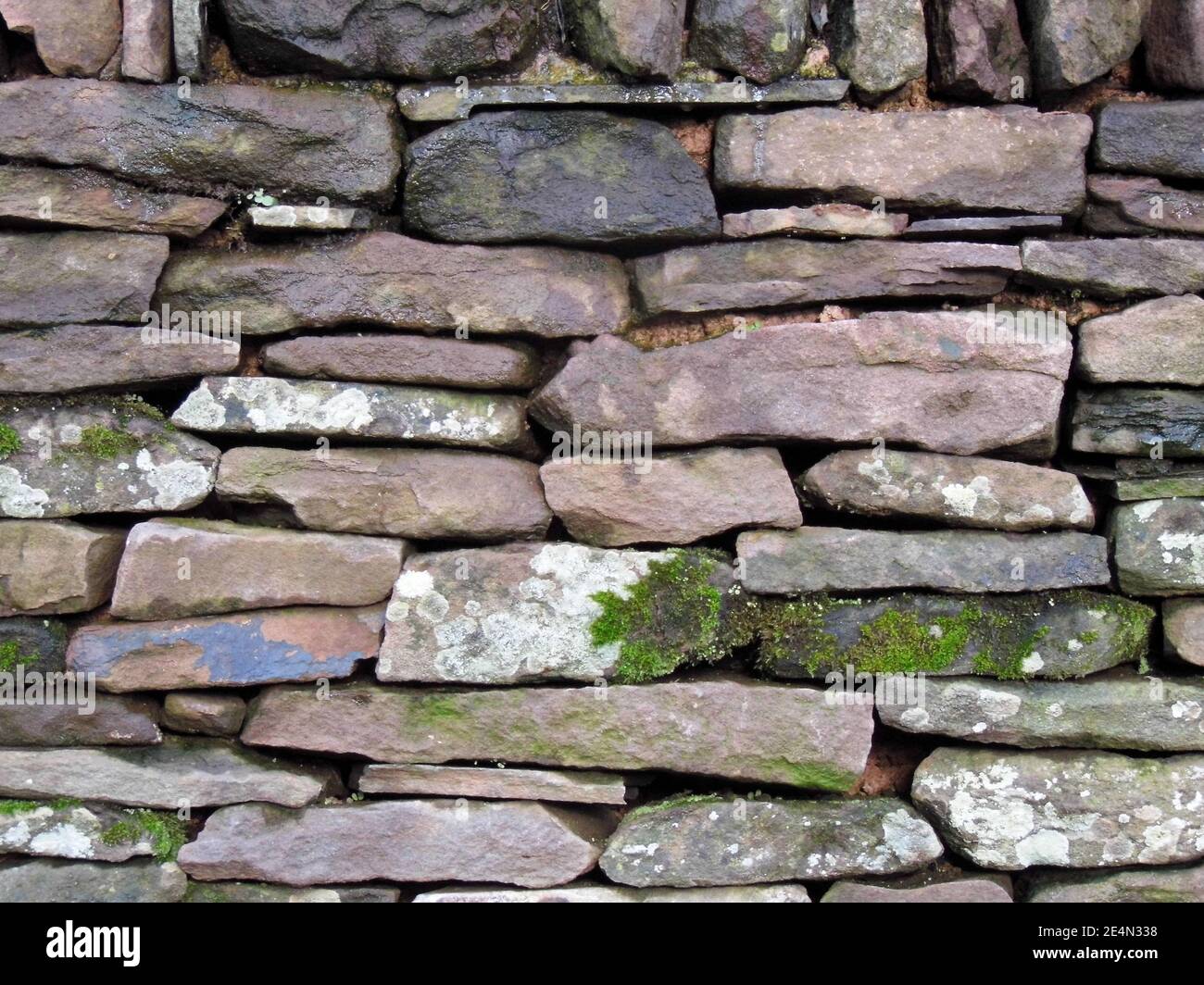 Old stone wall texture background Stock Photo - Alamy