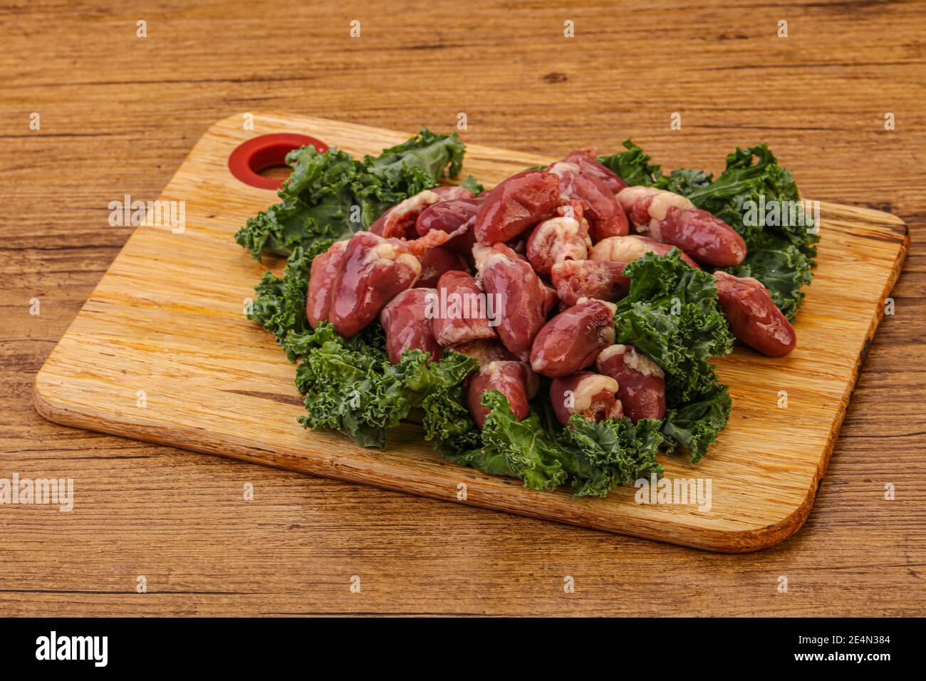 Raw chicken hearts heap for cooking Stock Photo - Alamy