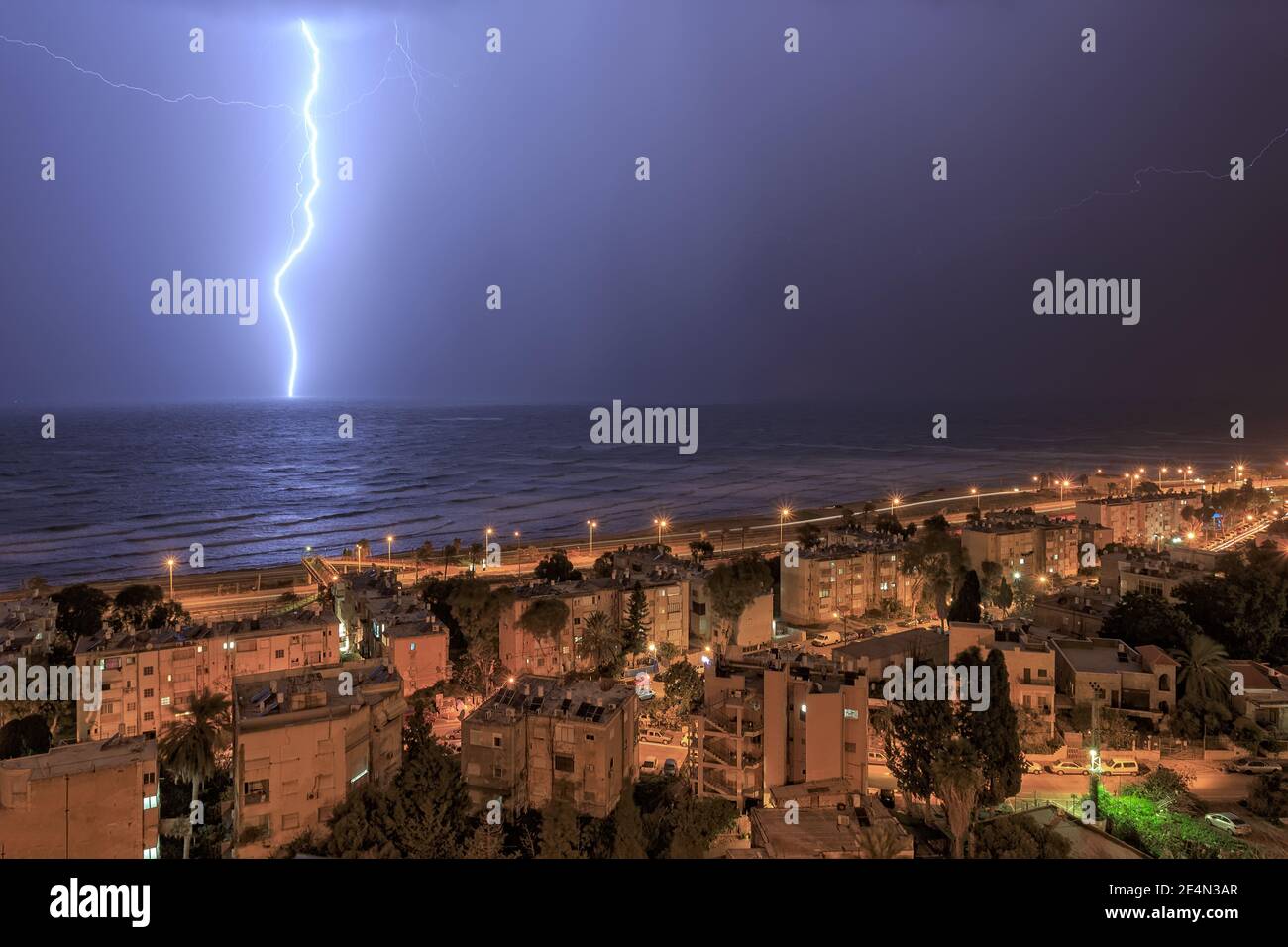 Severe thunderstorm and lightning out to sea Stock Photo - Alamy