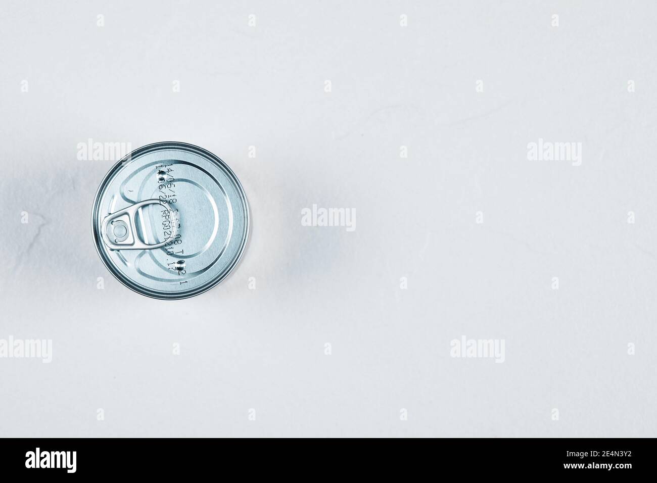 Closed tin can on a white background Stock Photo - Alamy