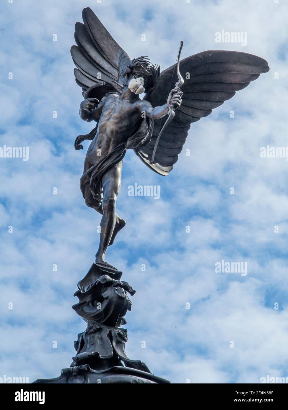 A facemask on Eros in central London Stock Photo - Alamy