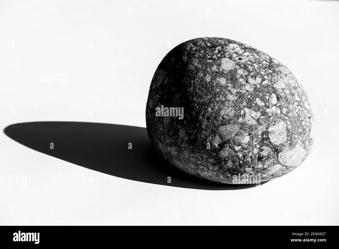 Round granite rock on white background Stock Photo - Alamy