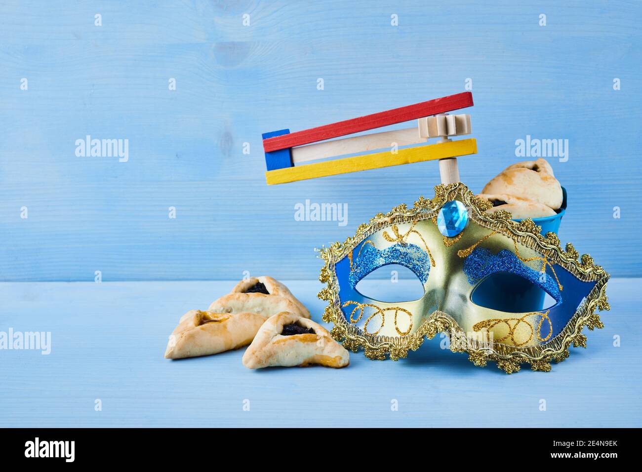 Purim celebration concept with hamantashen cookies, Purim mask and toy ...