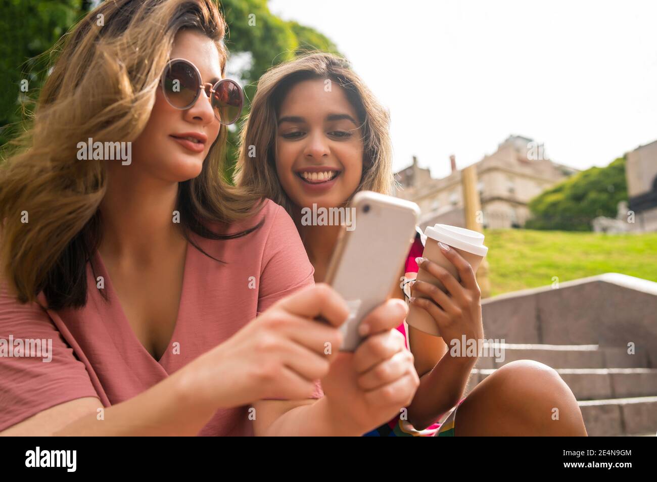 Happy friends talking laughing using hi-res stock photography and ...