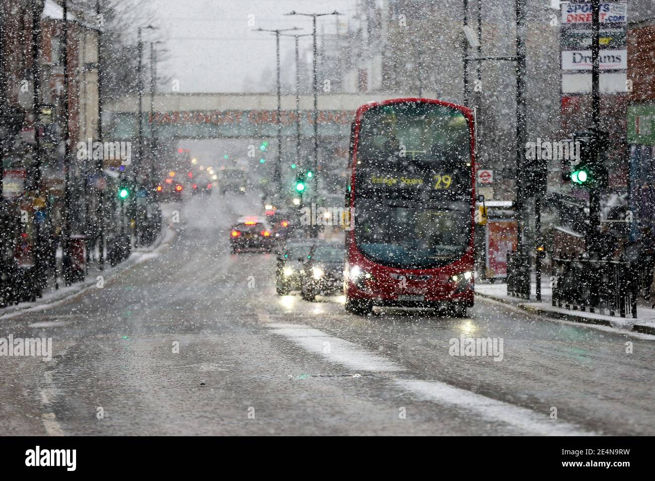 London bus and traffic seen during the heavy snowfall in north London ...