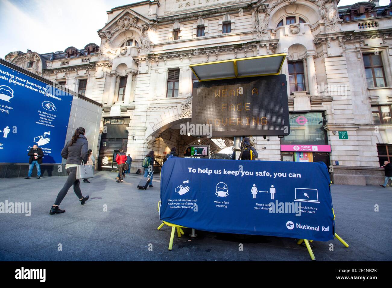 Victoria station sign face covering hi-res stock photography and images ...