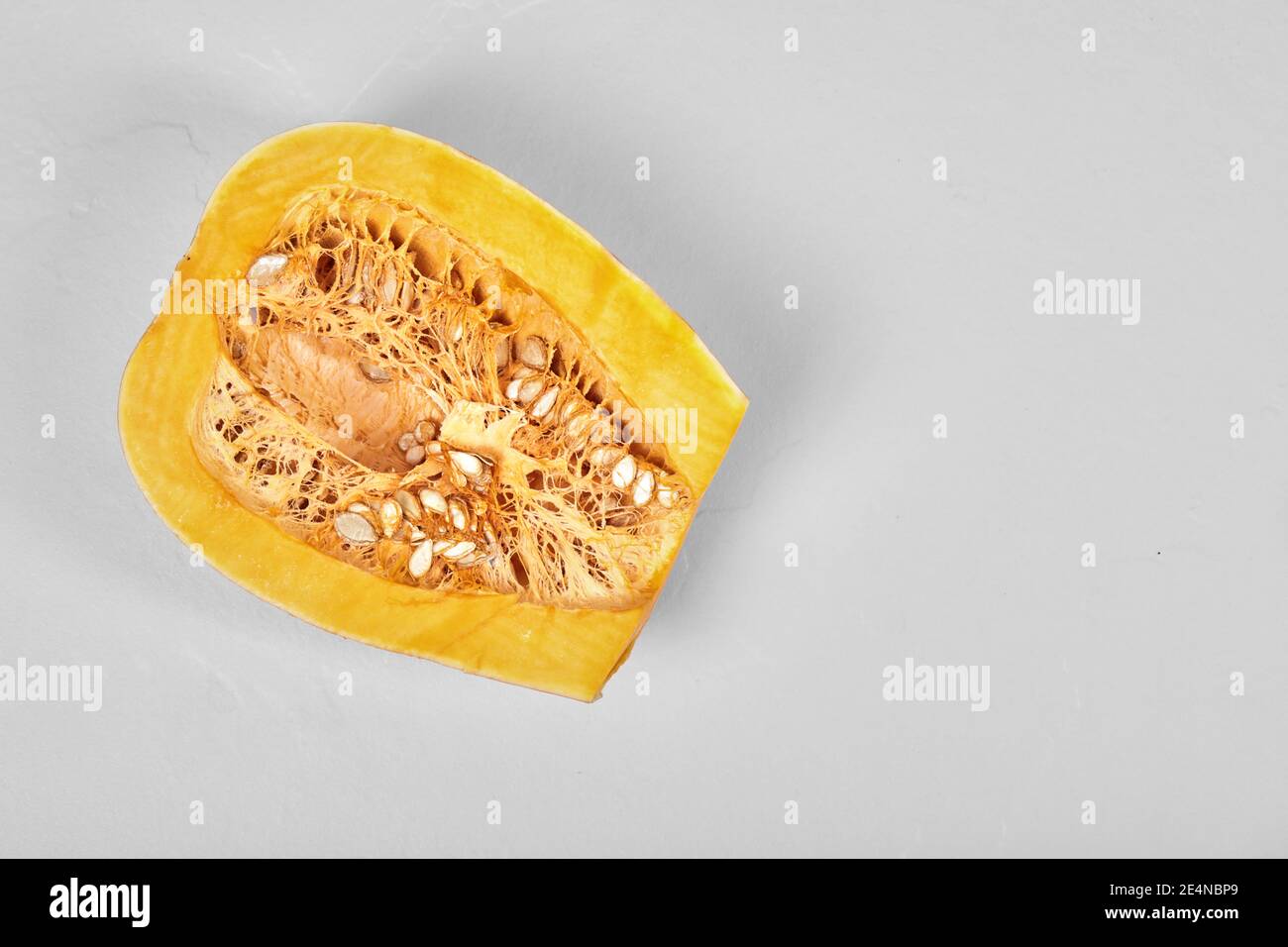 Half cut fresh pumpkin isolated on white background Stock Photo - Alamy