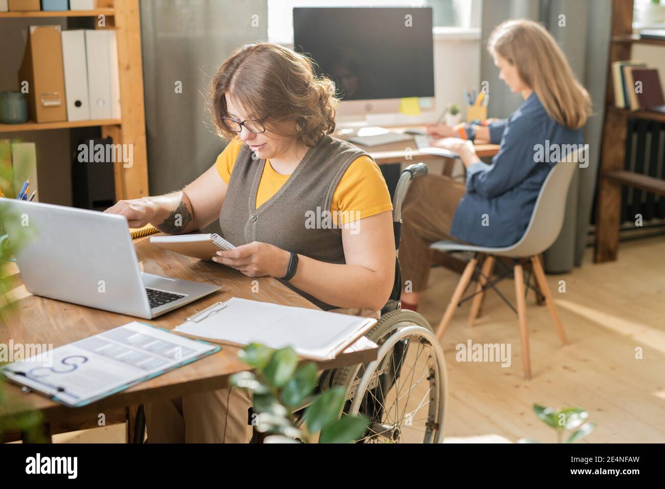 Young busy disable office hi-res stock photography and images - Alamy