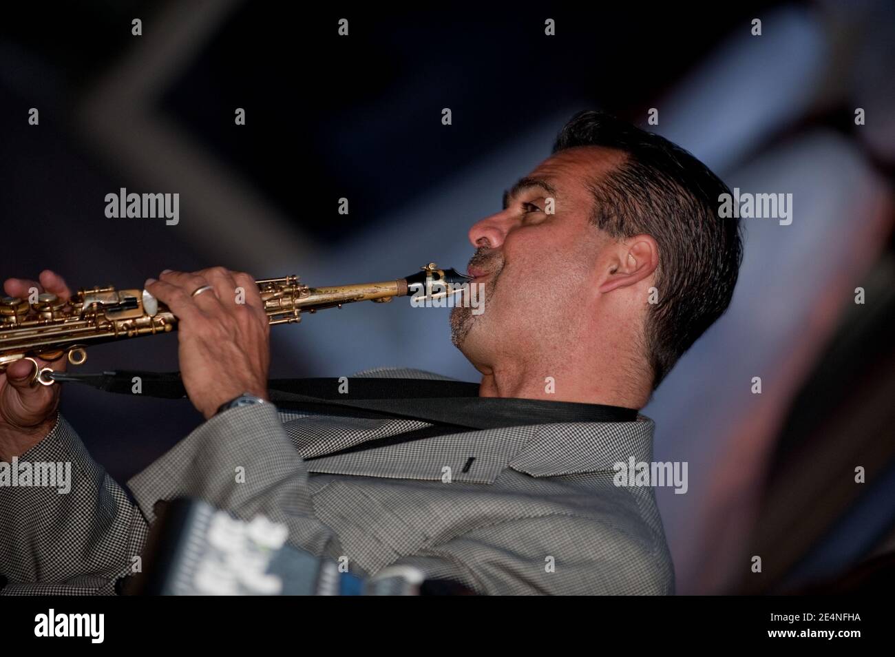 Duets of Saxophone and Guitar by Two Male Musicians at a Party Stock ...