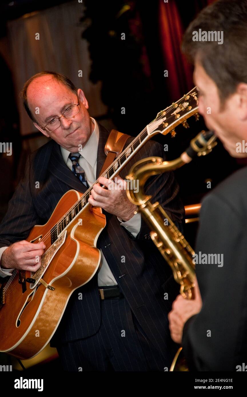 Guitar And Saxophone Duet High Resolution Stock Photography and Images ...