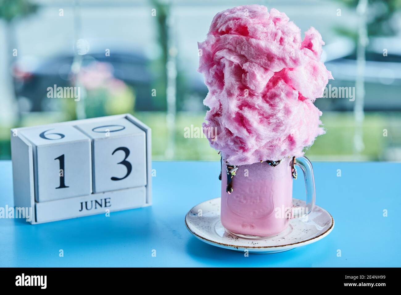 Bubble gum milkshake on the ceramic plate with a calendar Stock Photo ...
