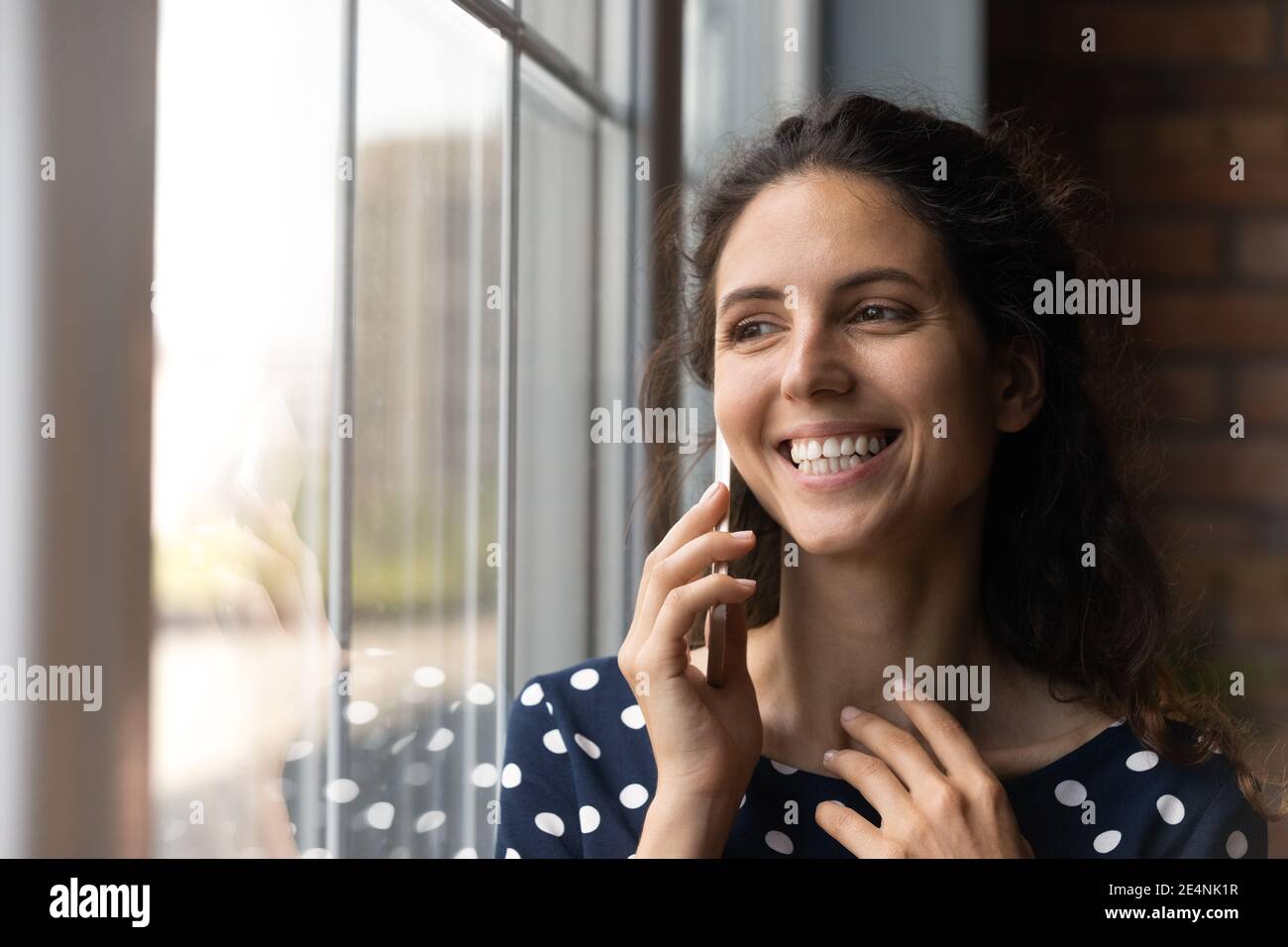 Happy woman smile have pleasant smartphone call Stock Photo - Alamy
